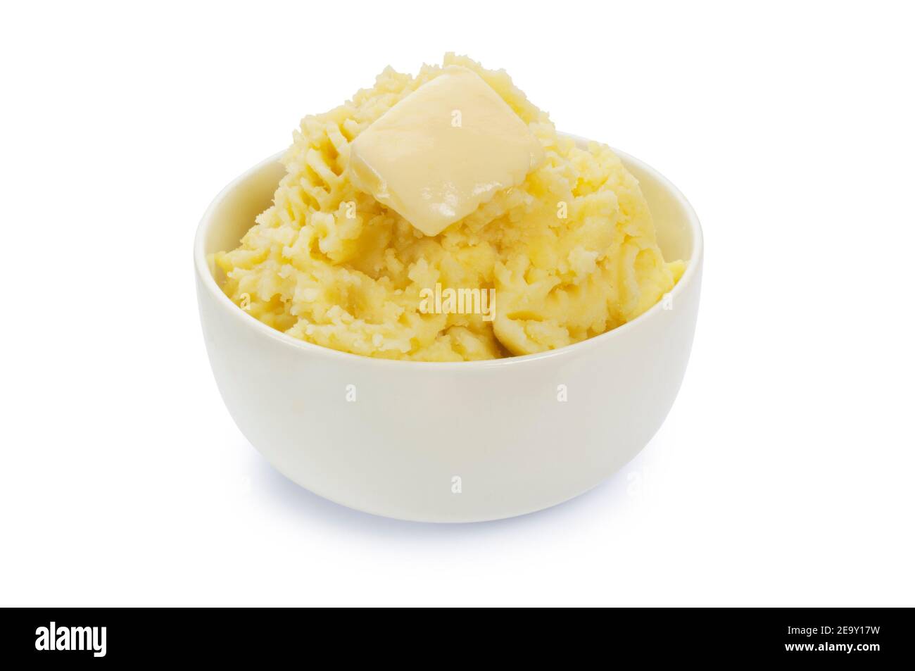 Studio shot of buttery mashed potato cut out against a white background ...