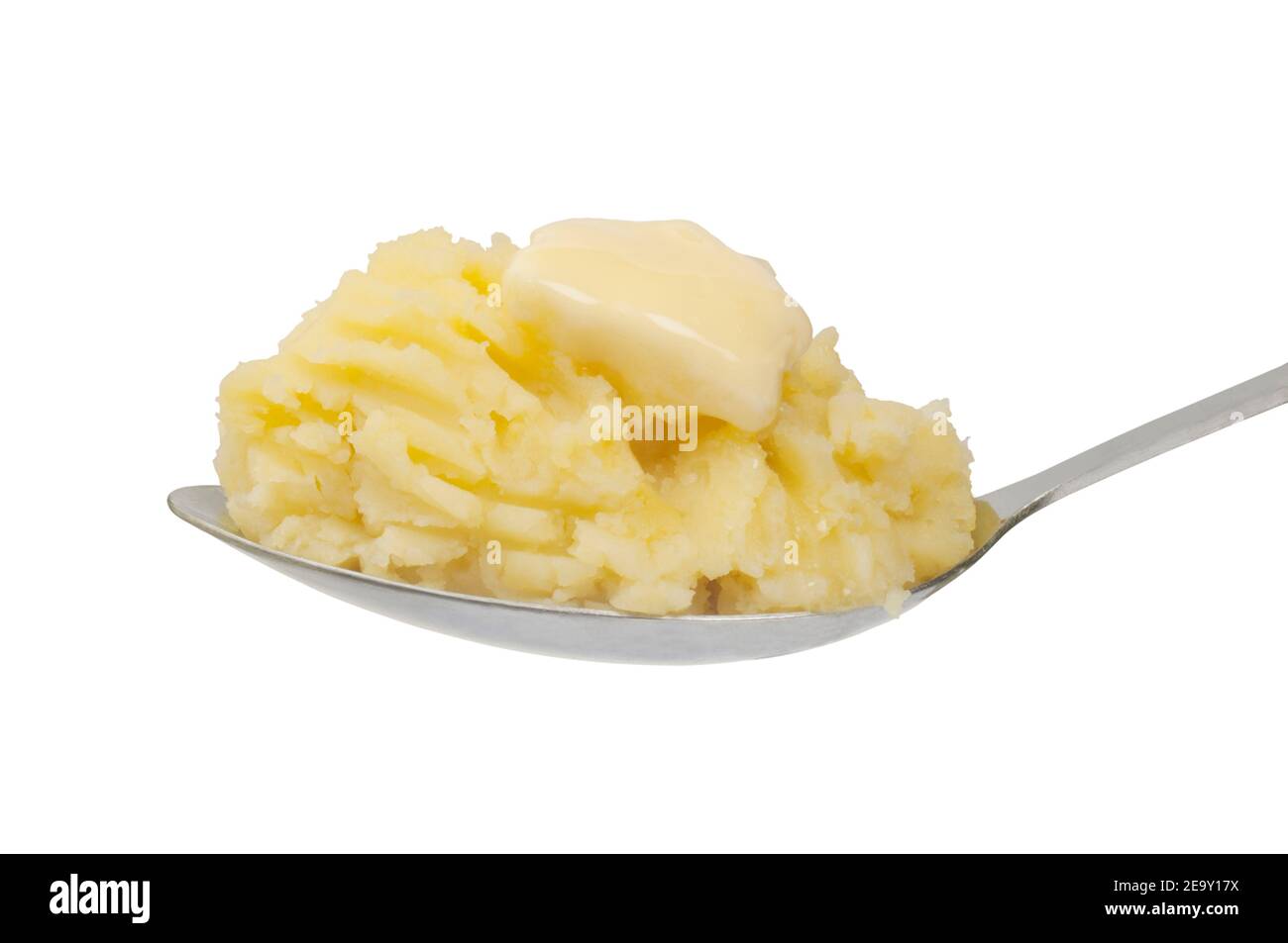 Studio shot of buttery mashed potato cut out against a white background ...