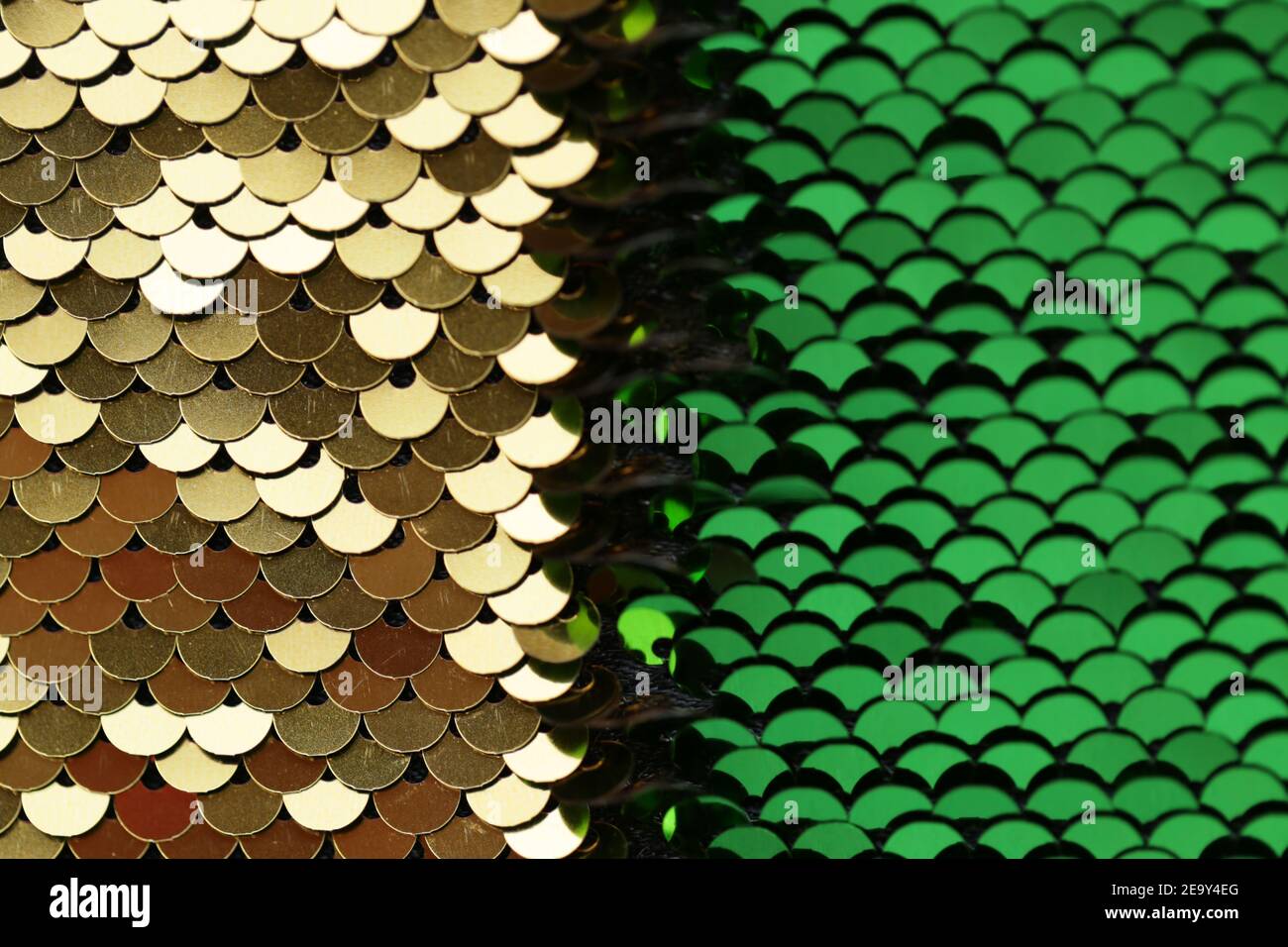 Sequins background Green and gold sequins half background. vibrant ...