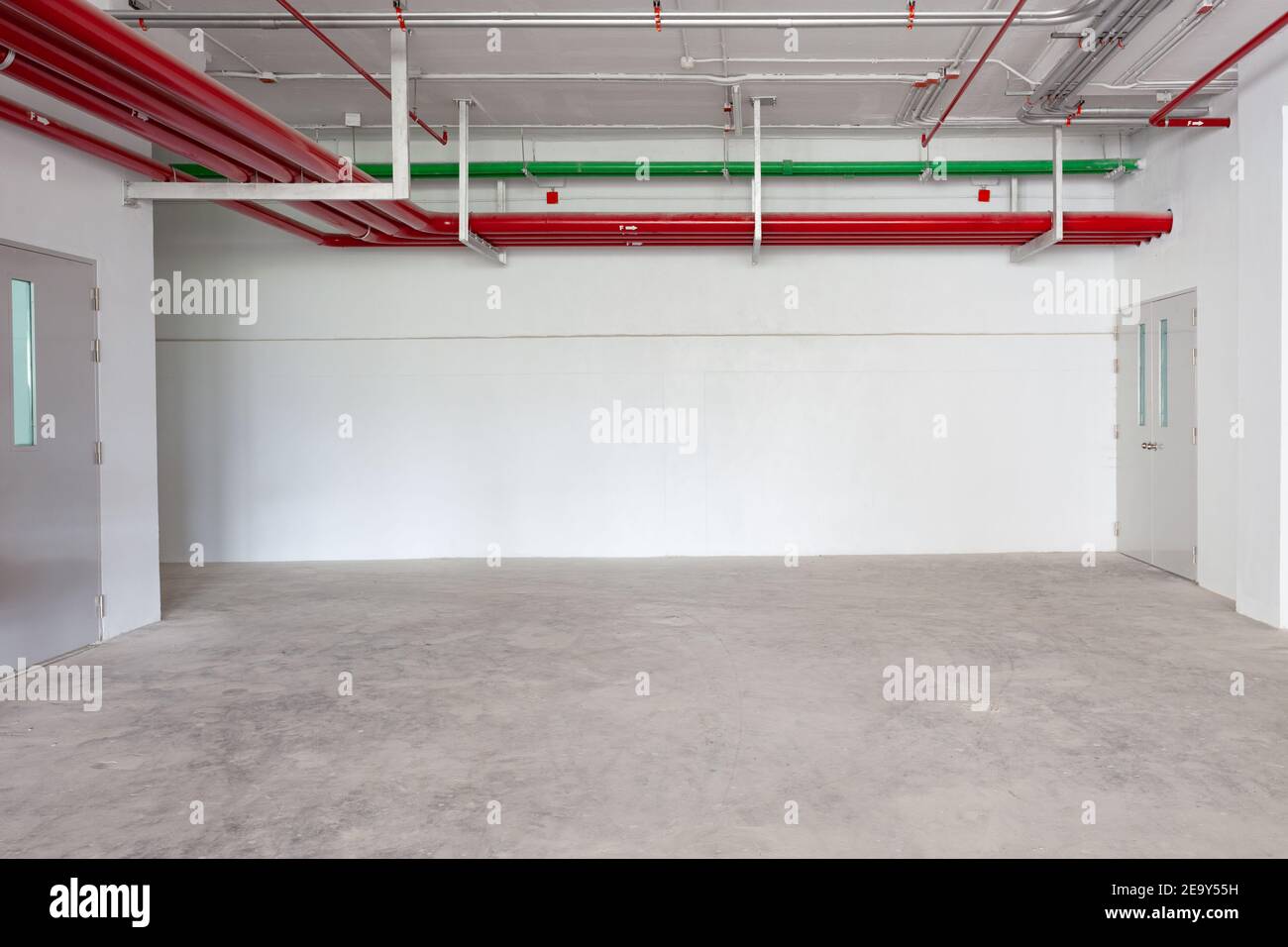 Parking garage interior Industrial building Hydrant with water hoses in ...