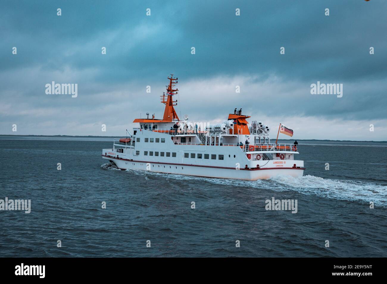 Langeoog ship on the sea with beautiful blue sky and water Stock Photo ...