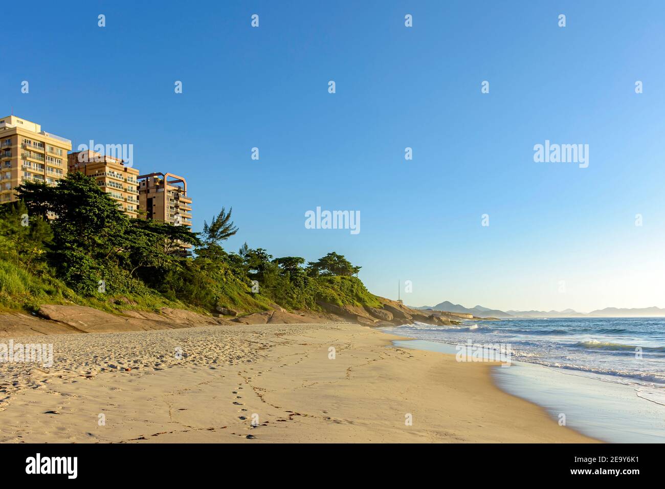 Devil's Beach in Ipanema Rio de Janeiro deserted at dawn with mountains ...