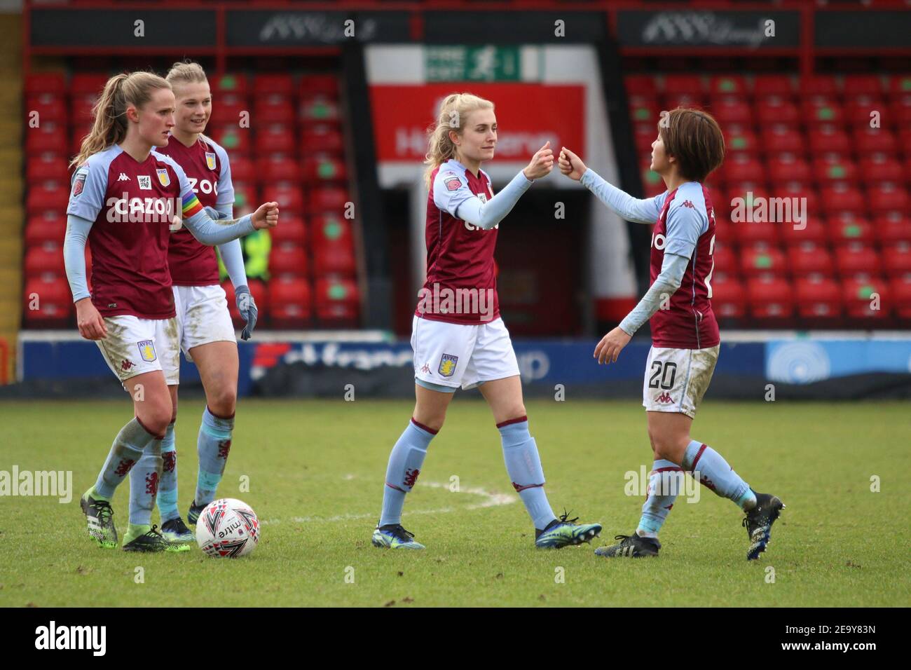 Emma Follis (#7 Aston Villa) and Mana Iwabuchi (#20 Aston Villa) fist ...