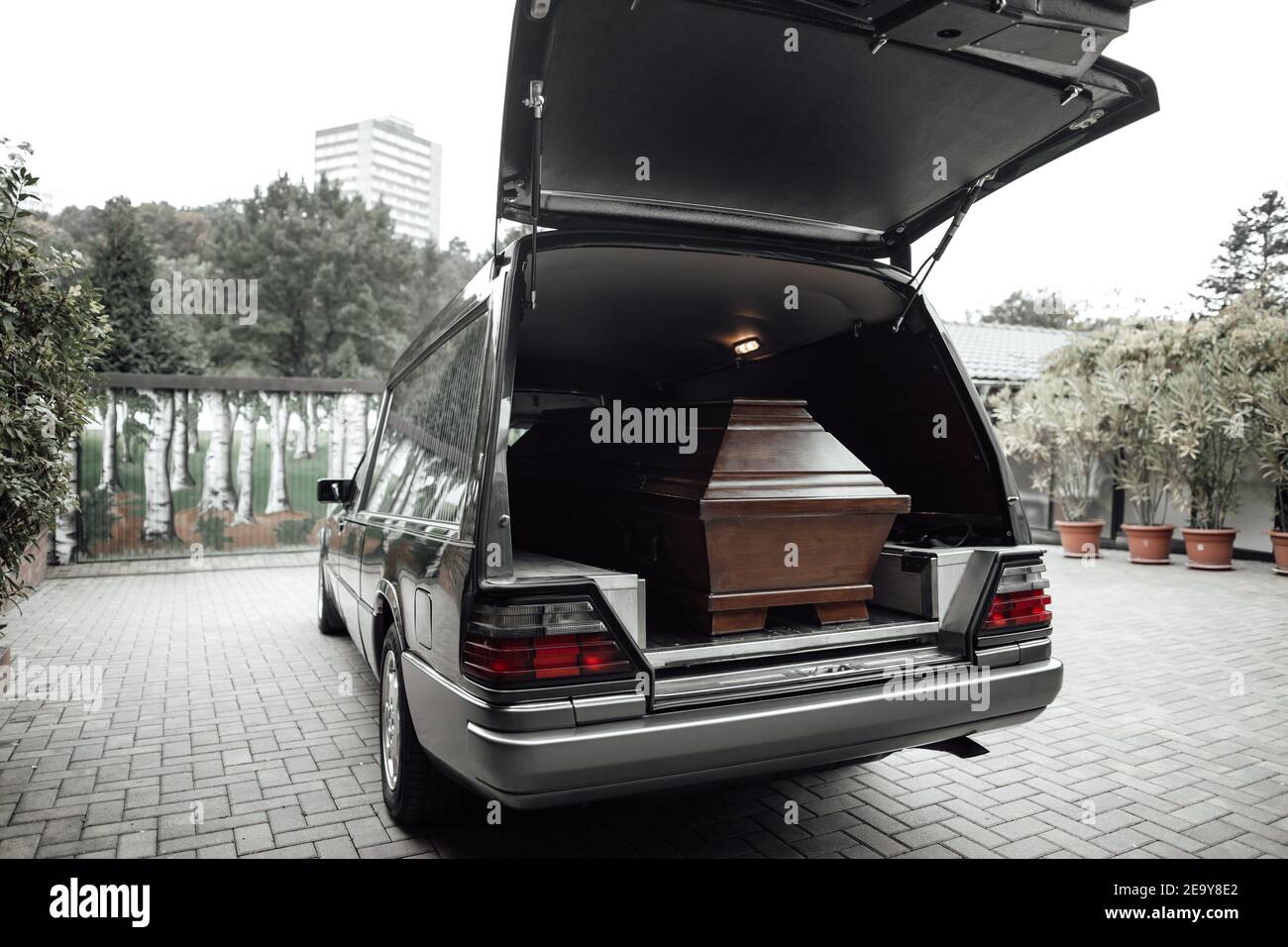 photo of a casket in a van at a funeral Stock Photo - Alamy