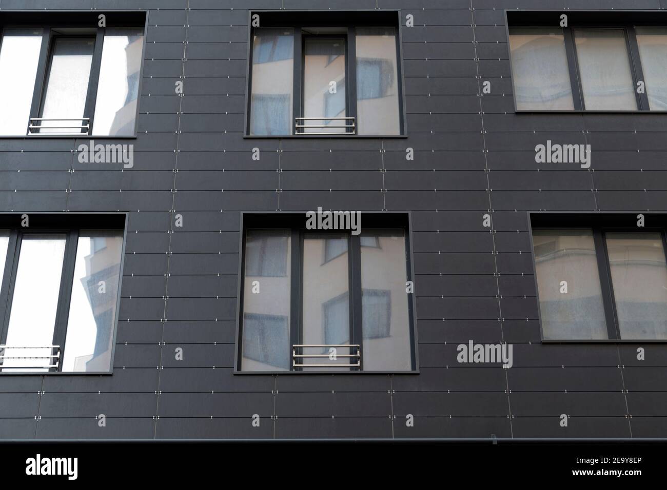 Modern facade of a multi storey building. Contemporary architecture of ...