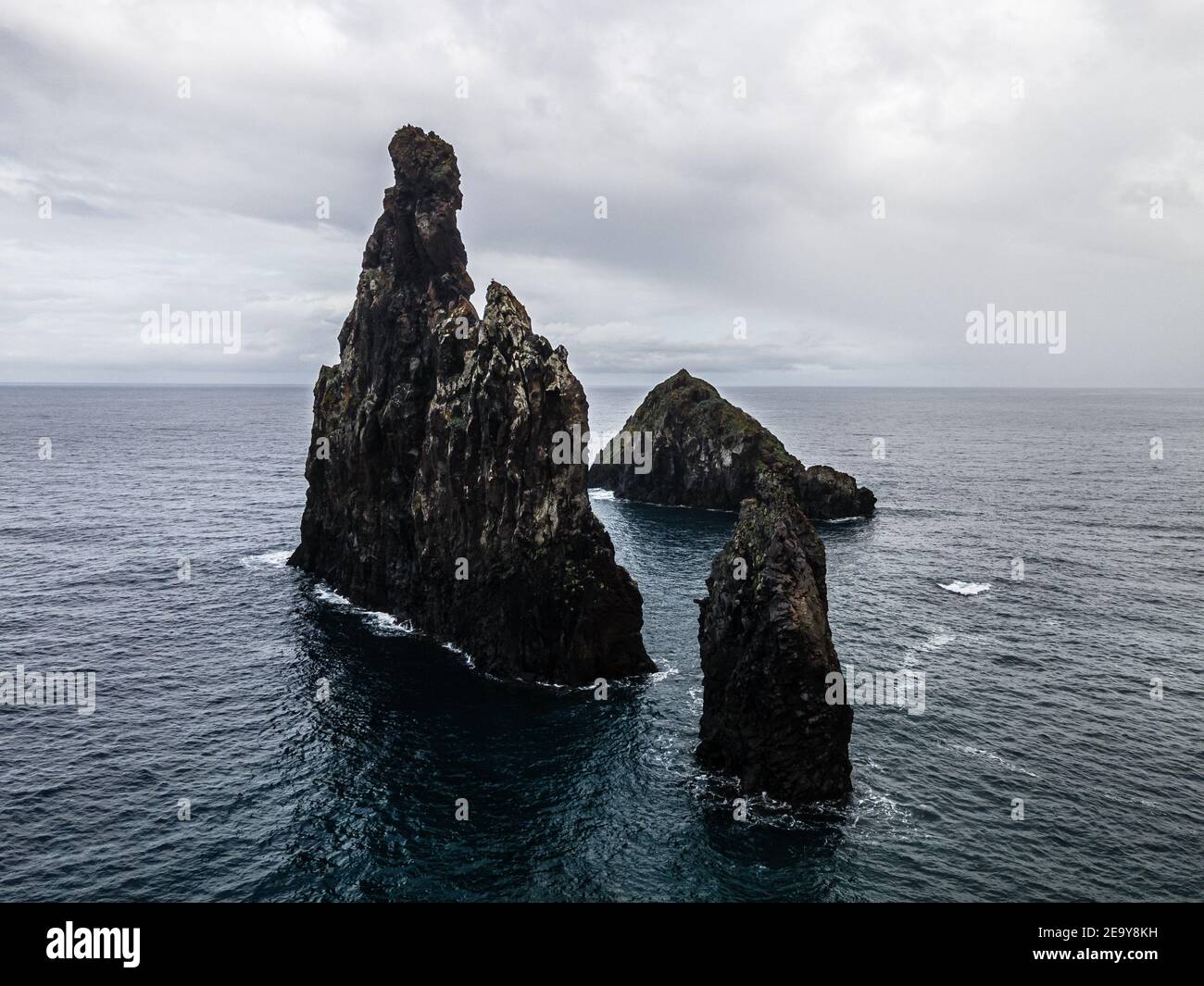 Outstanding rocks in the sea on the coast of Madeira Island Stock Photo ...