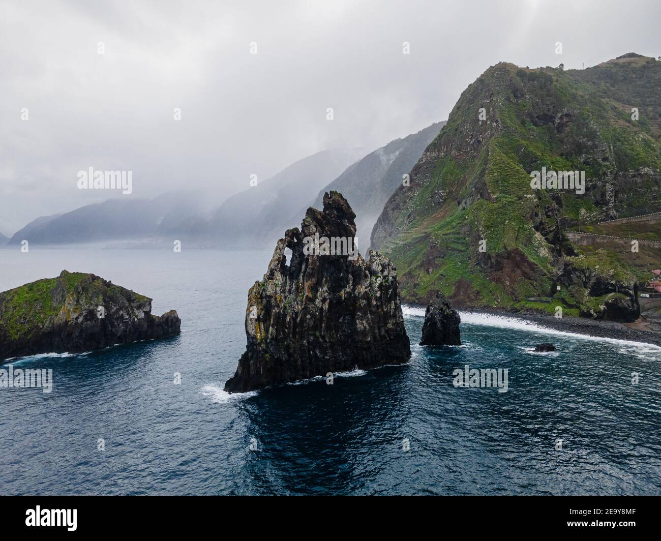 Outstanding rocks in the sea on the coast of Madeira Island Stock Photo ...