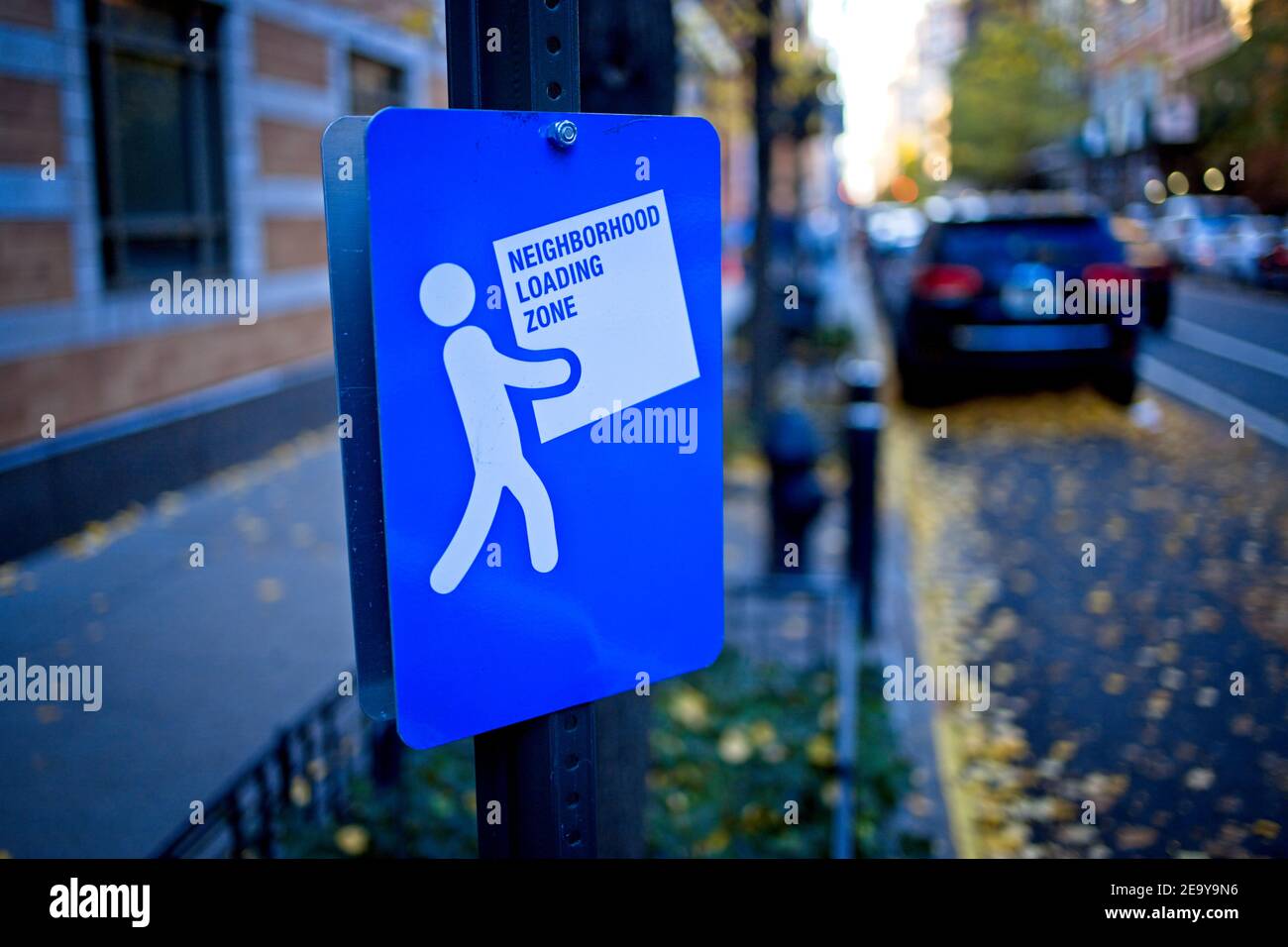 Sidewalk sign indicating that parking space is used as a neighborhood ...