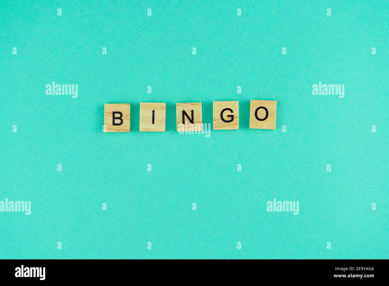 Word bingo. The phrase is laid out in wooden letters. Top view ...