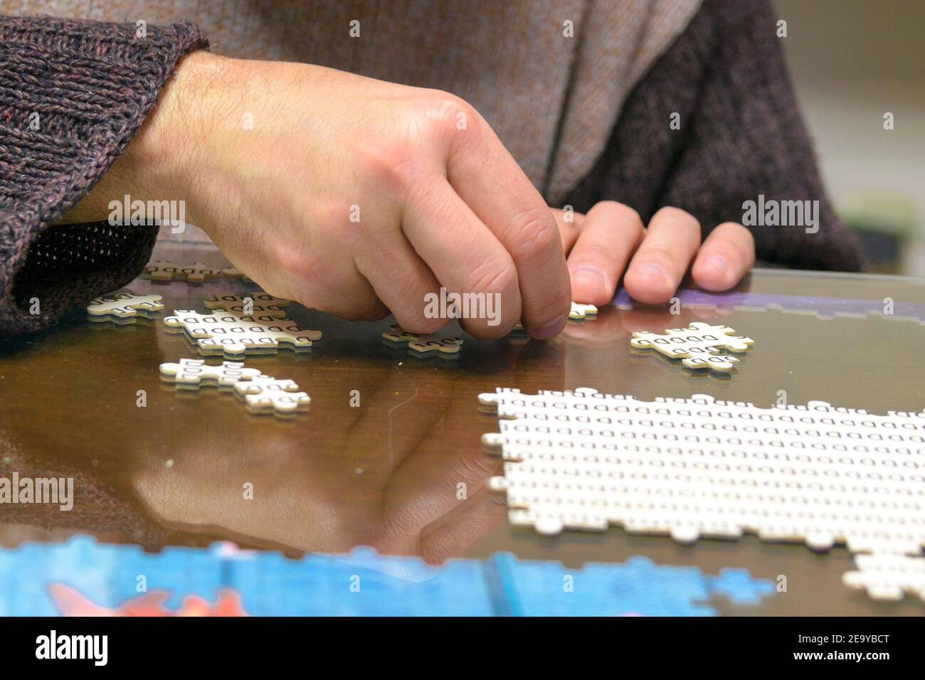 Kid doing puzzle hi-res stock photography and images - Alamy