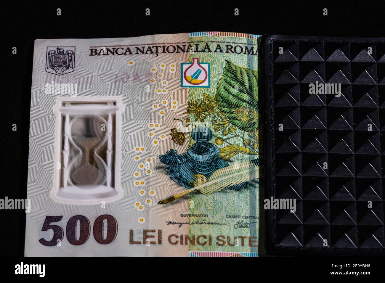 LEI romanian money banknotes in black wallet isolated Stock Photo - Alamy