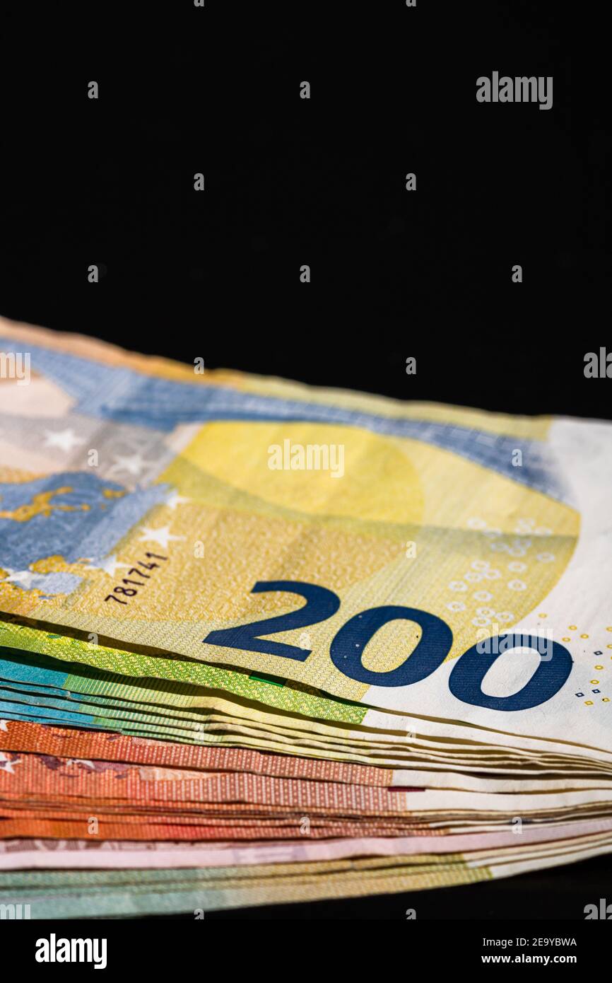 Close up on stack of EURO money. Euro banknotes isolated Stock Photo ...
