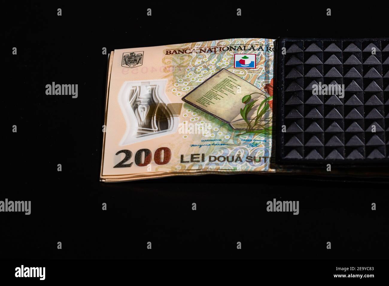 LEI romanian money banknotes in black wallet isolated Stock Photo - Alamy