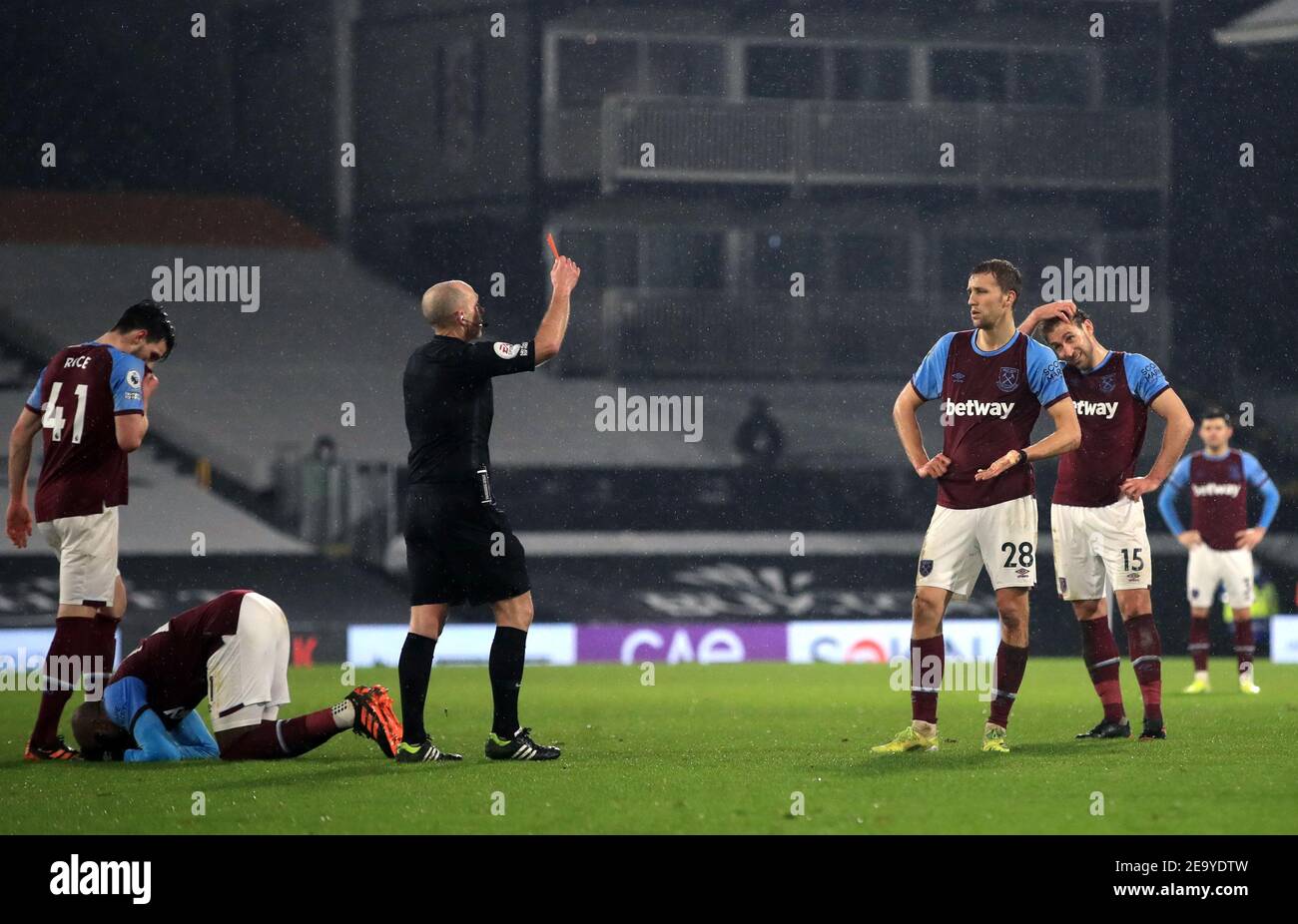 Mike dean red card hi-res stock photography and images - Alamy