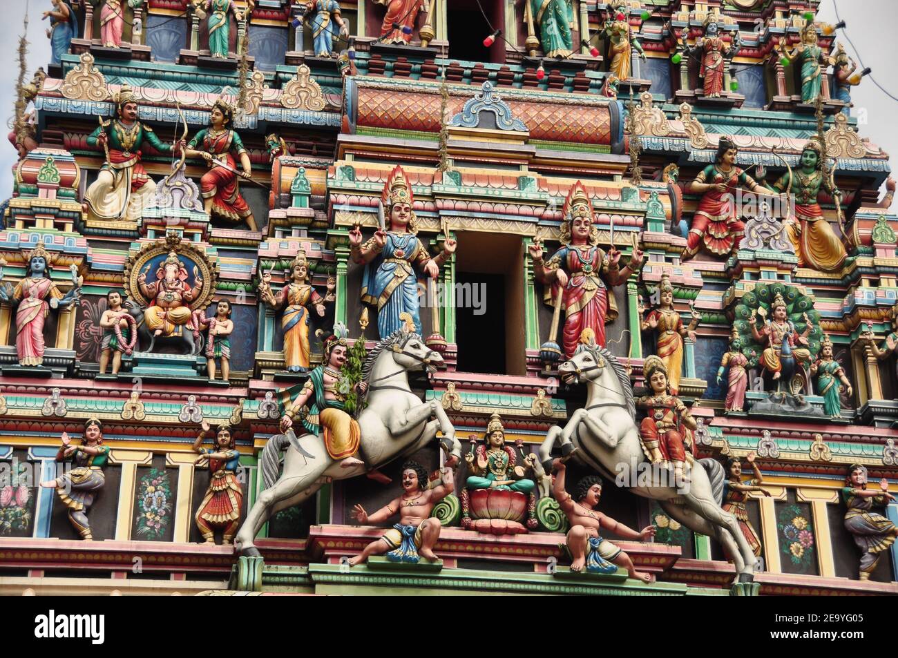 Exterior of colorful majestic facade of temple with sculptures and ...