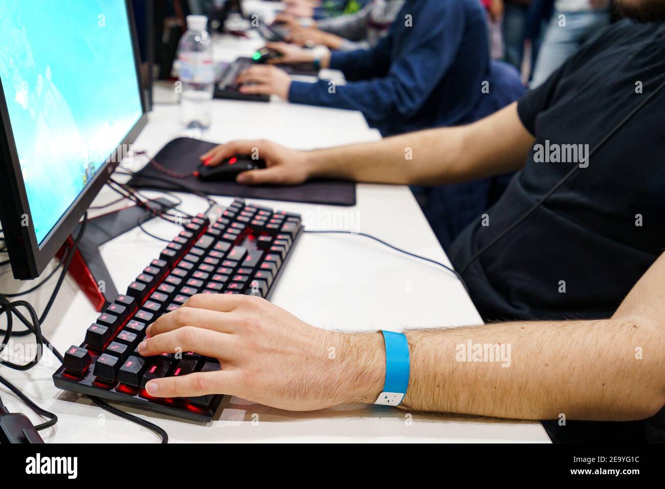 Man playing a video game on a PC Stock Photo - Alamy