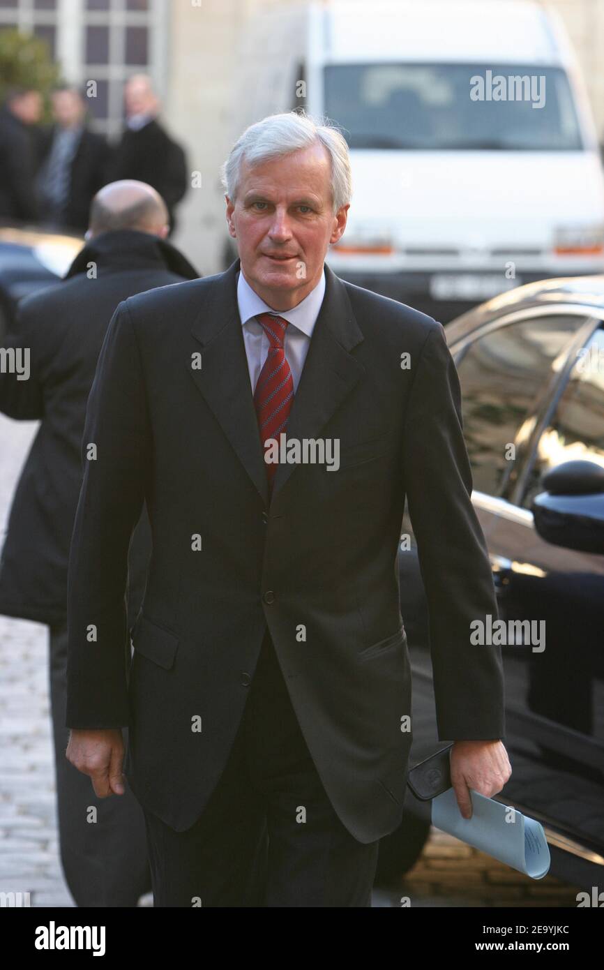 French Foreign Minister Michel Barnier arrives at the Hotel de Matignon ...