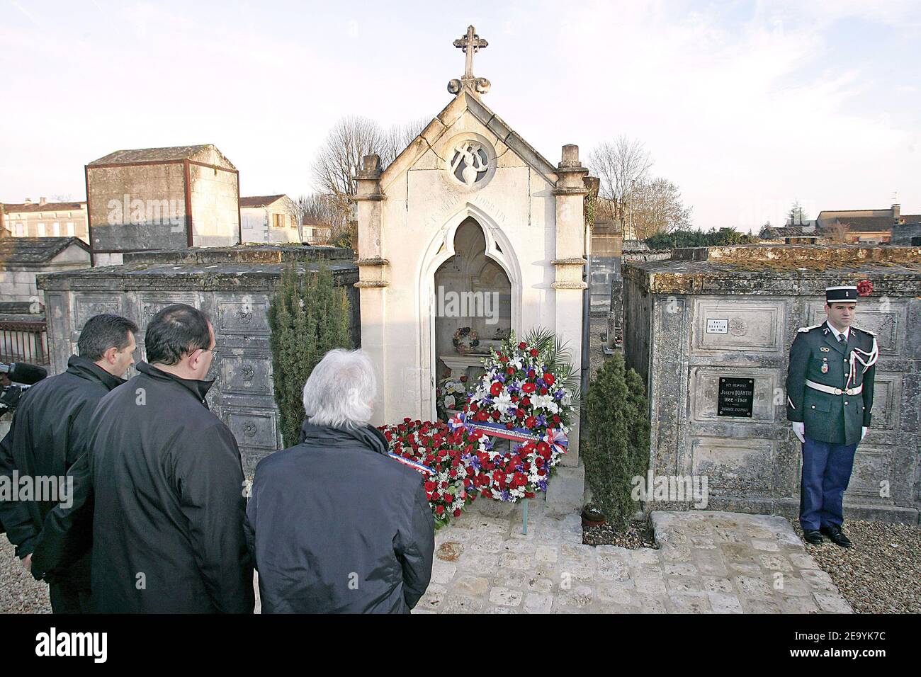 Sympathizers prays at late French President Francois Mitterrand's grave ...