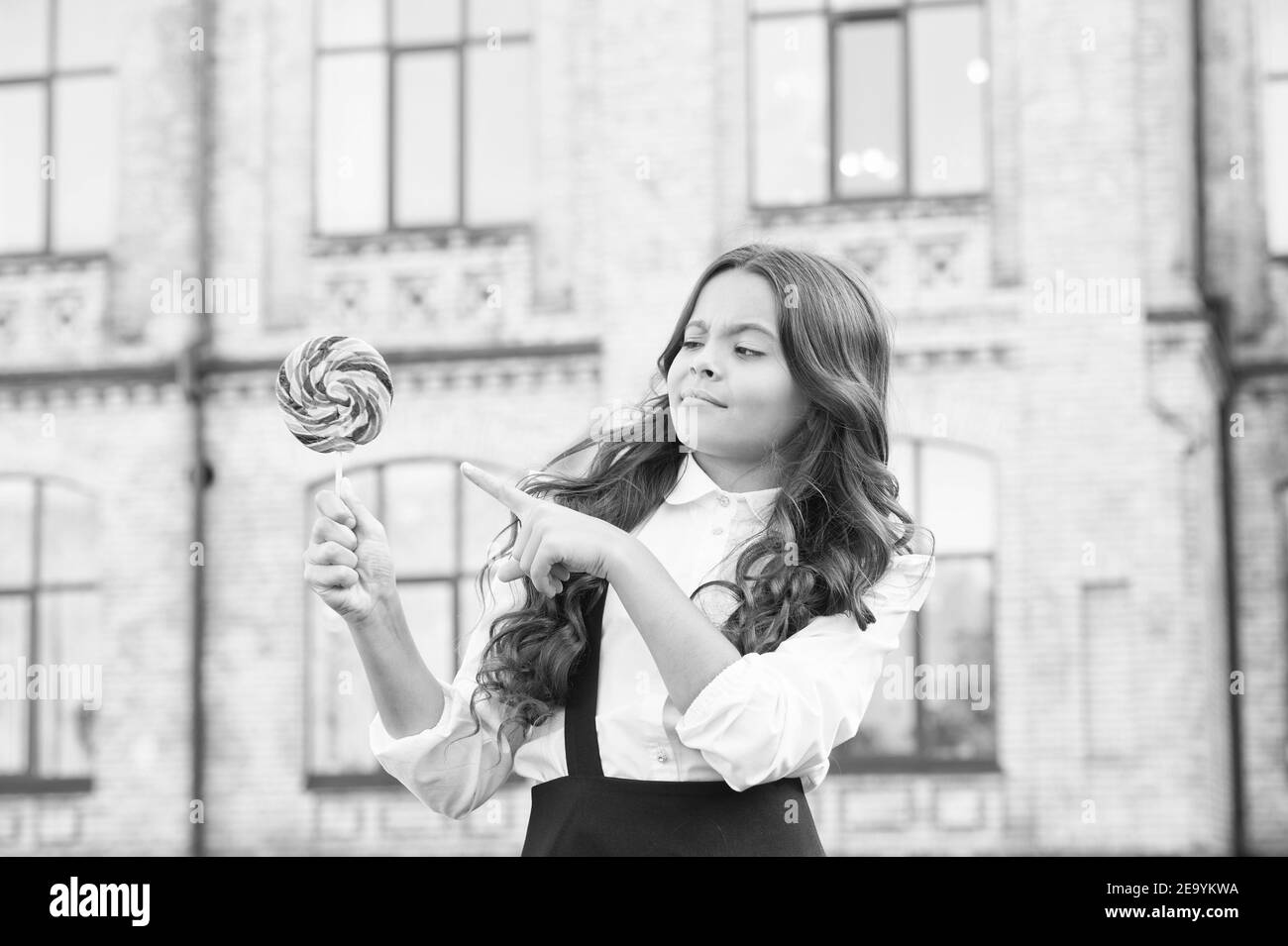 Sugar diet. Sweet joy. Happy kid with sweet candy. Happy childhood. Kid ...