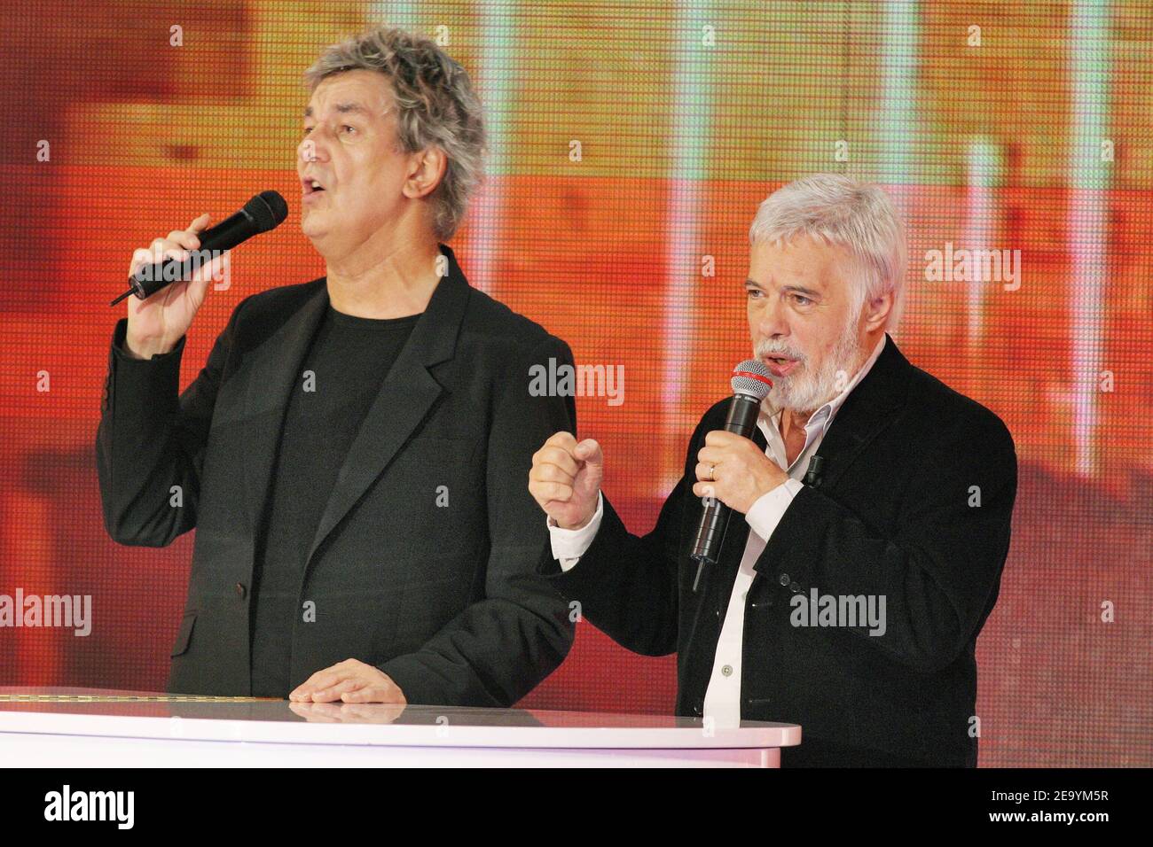 French humorist Guy Bedos and singer Jacques Higelin attend the taping ...