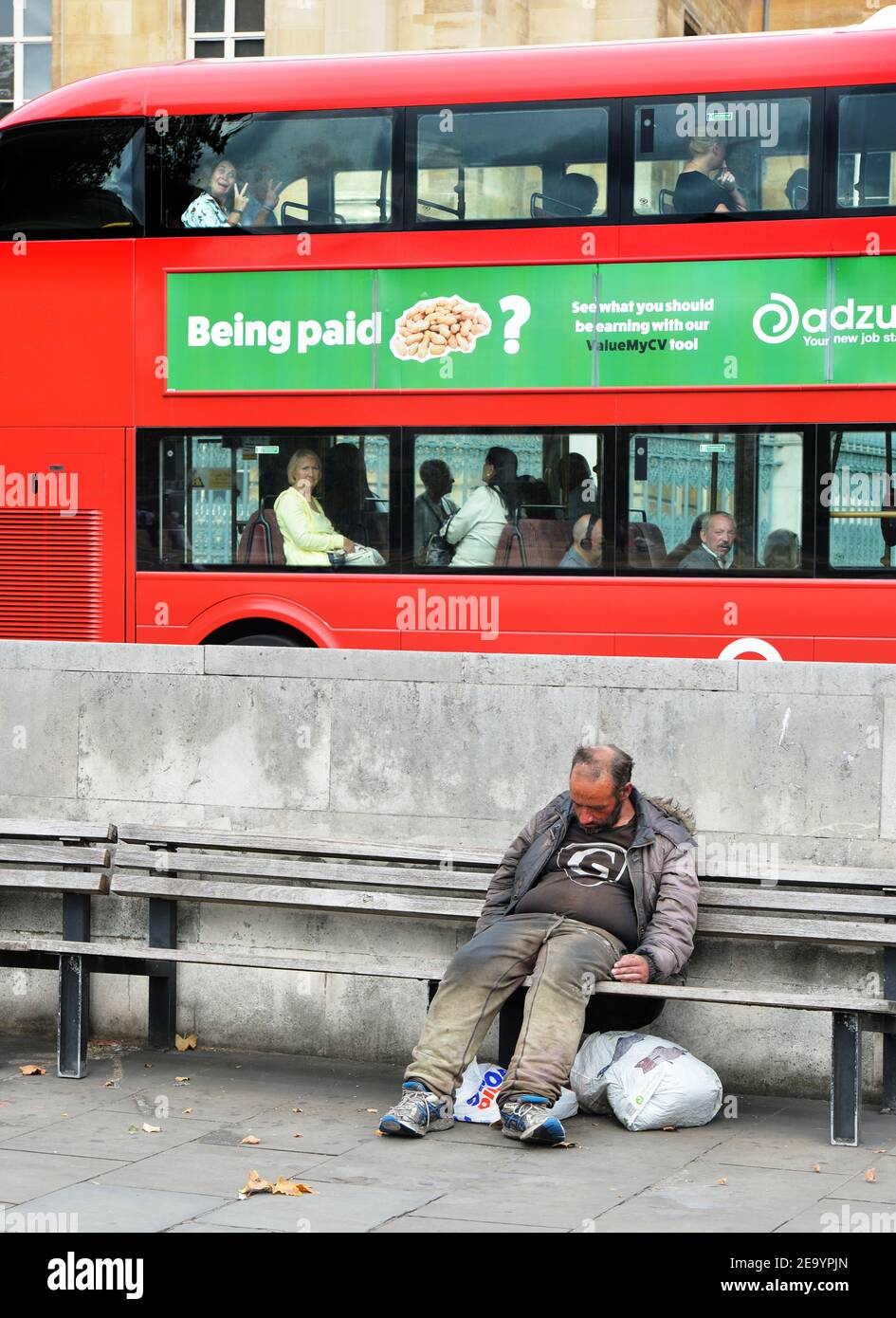 Homeless sleeping on bus hi-res stock photography and images - Alamy