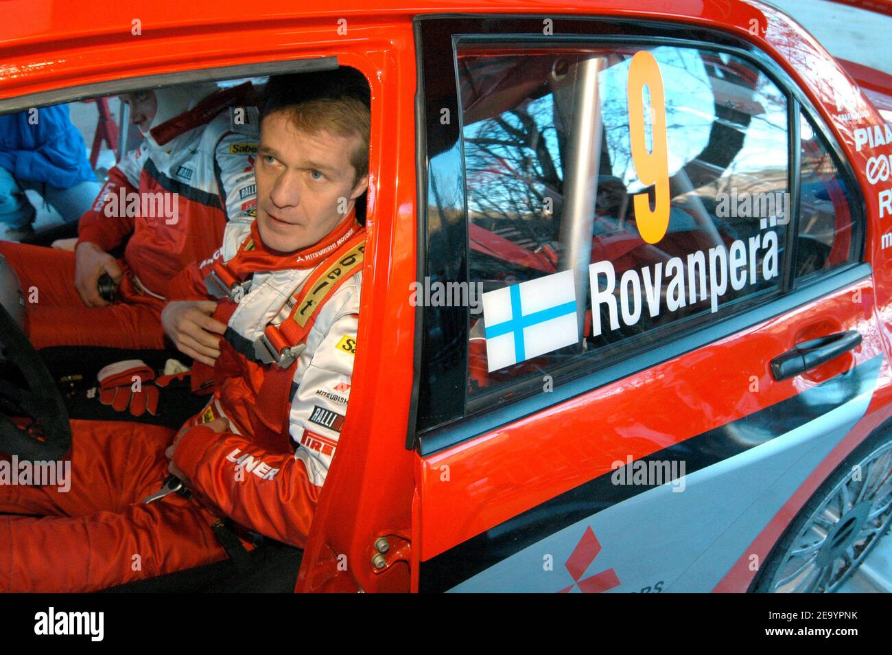 Rally driver Harri Rovanpera of Finland aboard his Mitsubishi Lancer ...