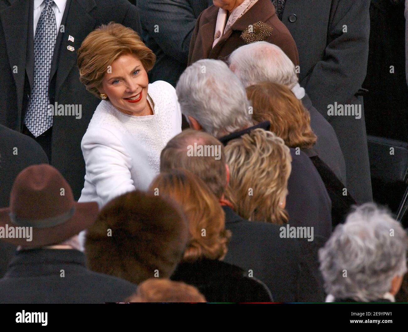 First Lady Laura Bush greets former President Clinton during ...