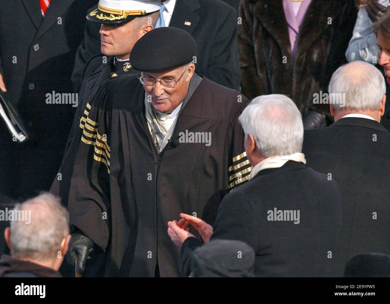 Chief Justice William Rehnquist makes his way to the podium to swear in ...