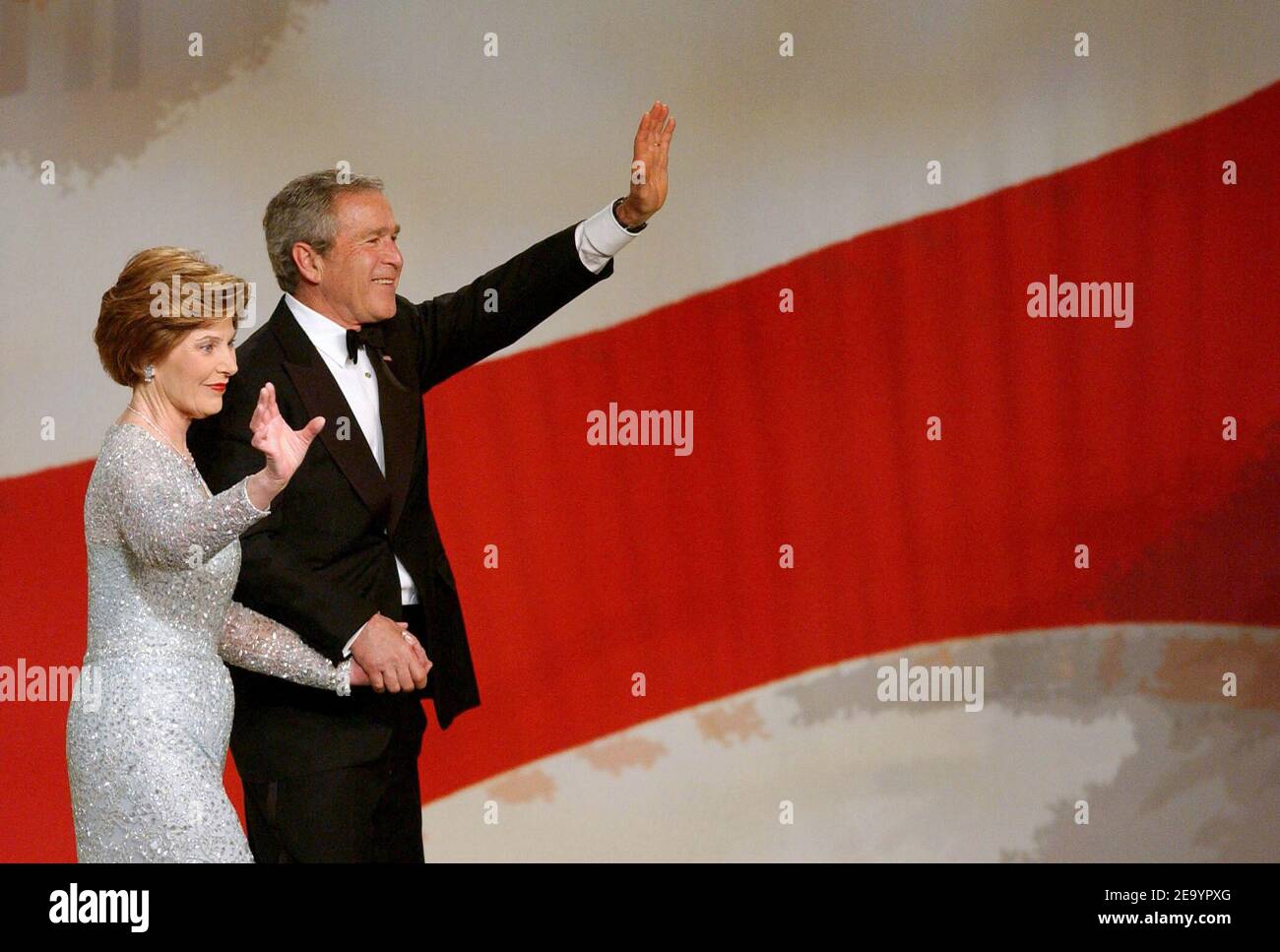 President George W. Bush and First Lady Laura Bush greet and address ...