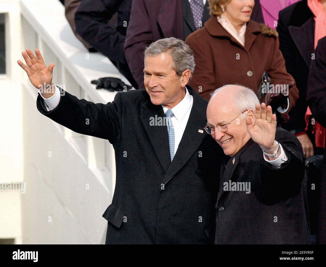 U.S. President George W. Bush and Vice President Dick Cheney wave to ...