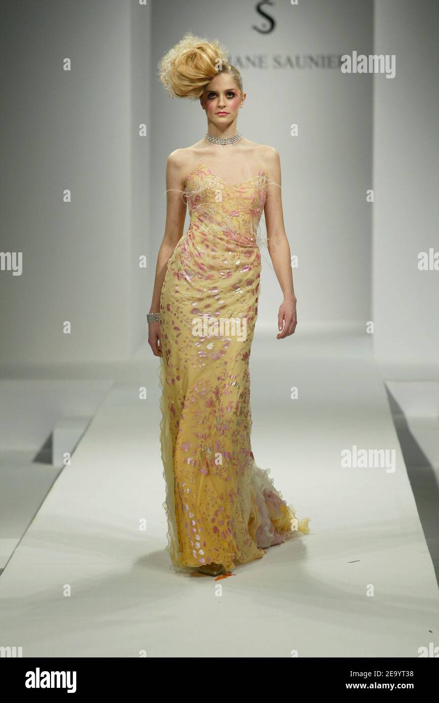 A model presents a creation by French designer Stephane Saunier for his ...