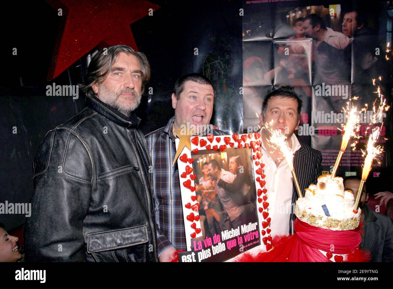 French humorist, movie director and cast member Michel Muller (R) with cast members Ludovic ...