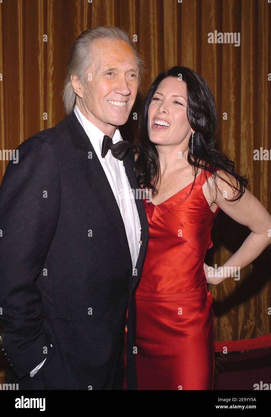 U.S. actor David Carradine and Annie Berman attend the 57th Annual DGA ...