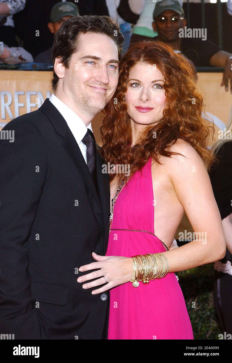 Debra Messing and her husband Daniel Zelman arrive at the 11th Annual Screen Actors Guild Awards ...