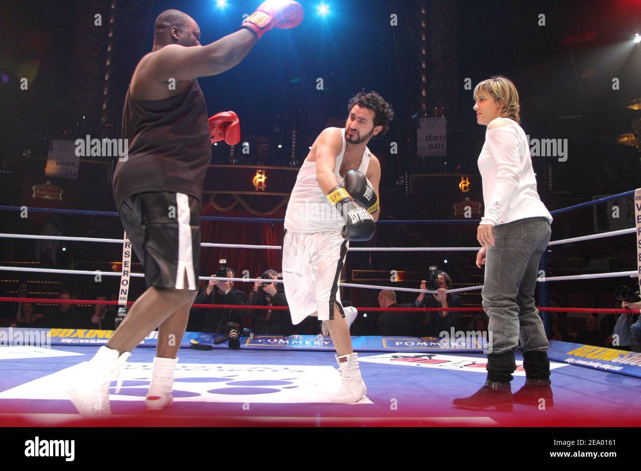 French actors Cyril Hanouna (C) and Mouss Diouf (R) participate in a ...