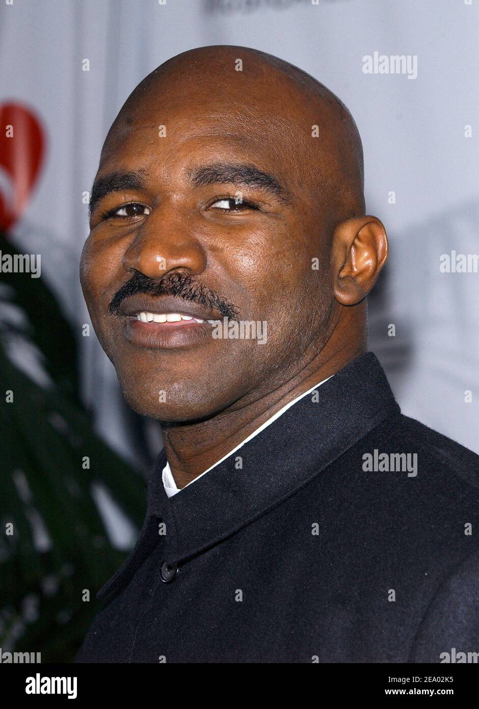 Evander Holyfield attends the Musicares 2005 Person Of The Year Tribute ...