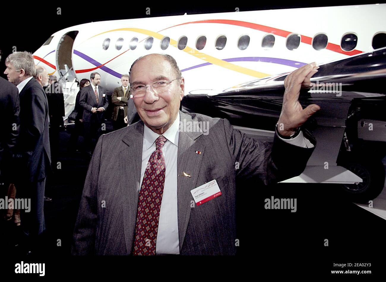 Dassault Aviation CEO Serge Dassault poses in front of the new Falcon ...