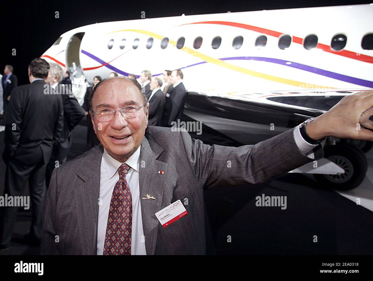 Dassault Aviation CEO Serge Dassault poses in front of the new Falcon ...