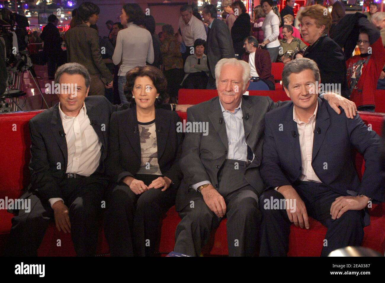 French TV presenter Pierre Bellemare (2nd R) surrounded by his daughter ...