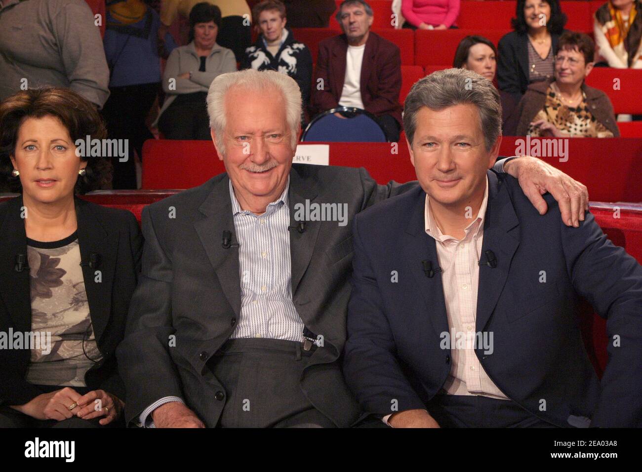 French TV presenter Pierre Bellemare C) with his daughter Francoise and ...