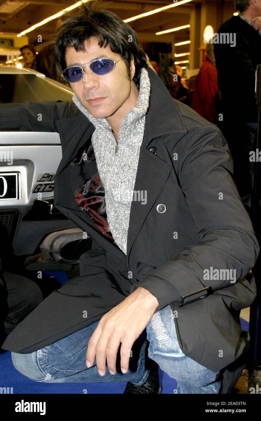 EXCLUSIVE. French singer Jean-Luc Lahaye (R) poses with luxuary cars ...