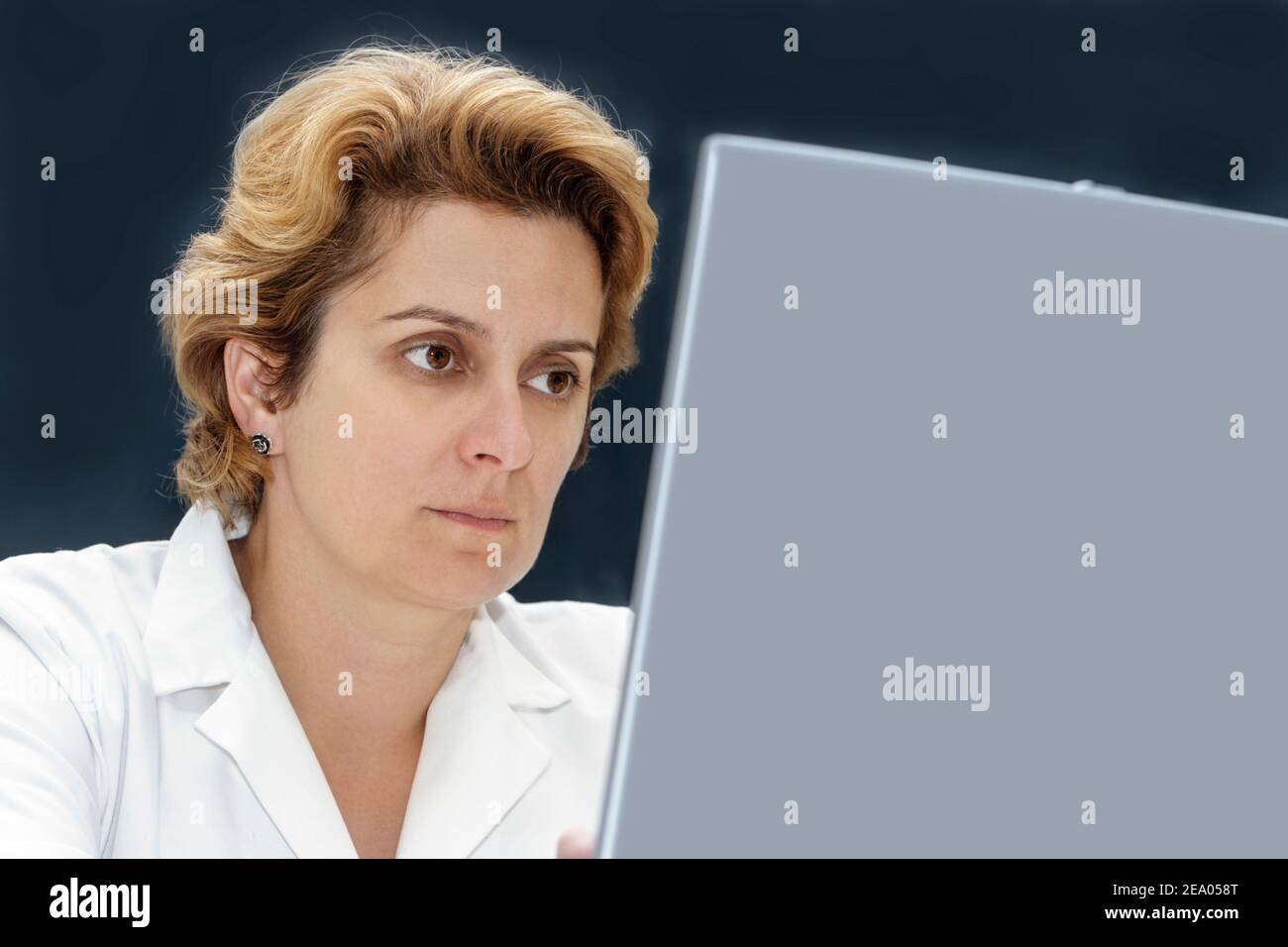 Female scientist working in front of her laptop in a laboratory Stock ...