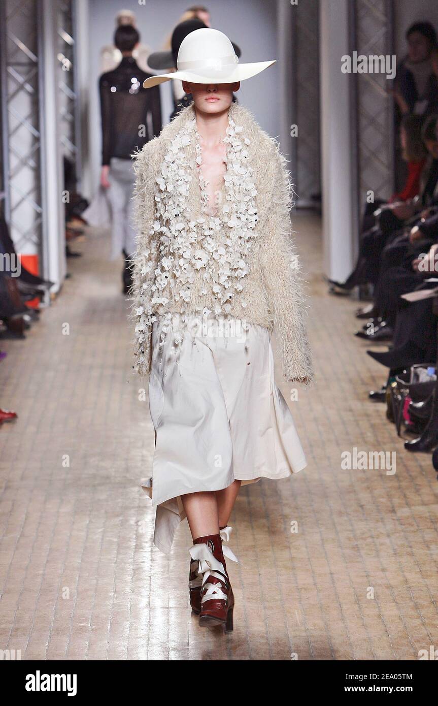 A model displays a creation by Japanese fashion designer Naoki Takizawa ...