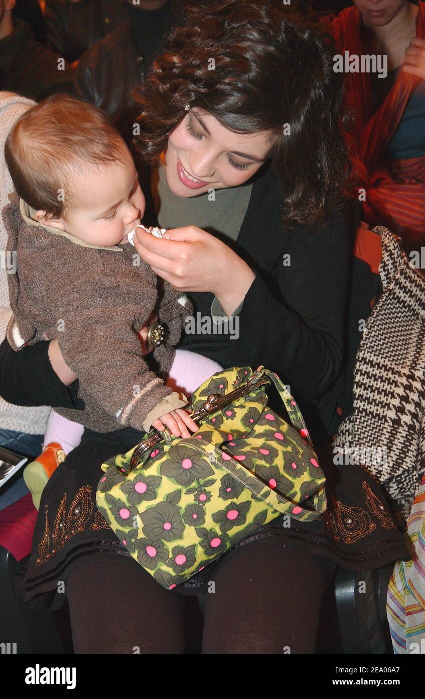 French actress Alysson Paradis with her goddaughter pictured before ...