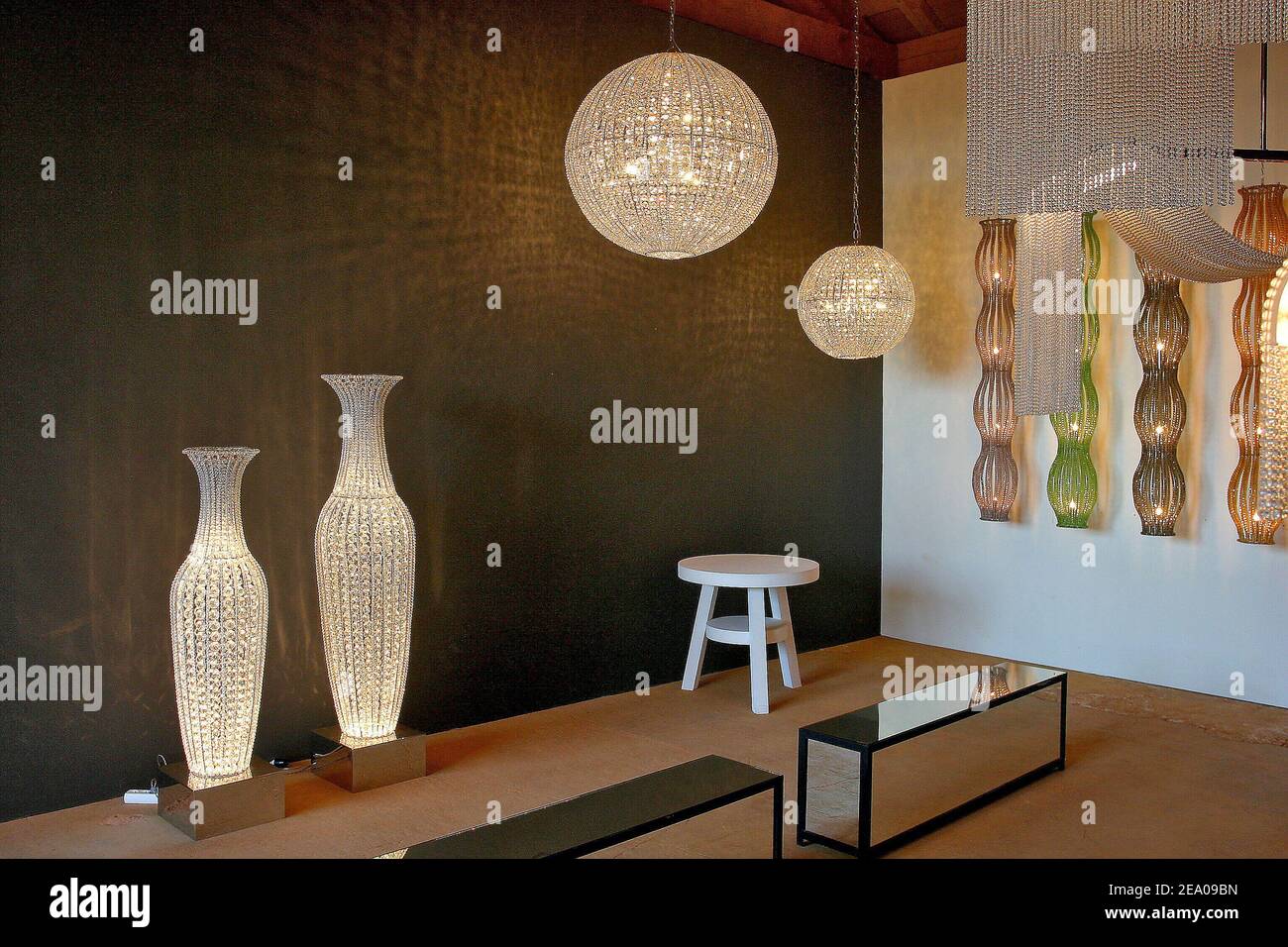 French chandelier designer, Regis Mathieu poses in his workshop, in Apt ...