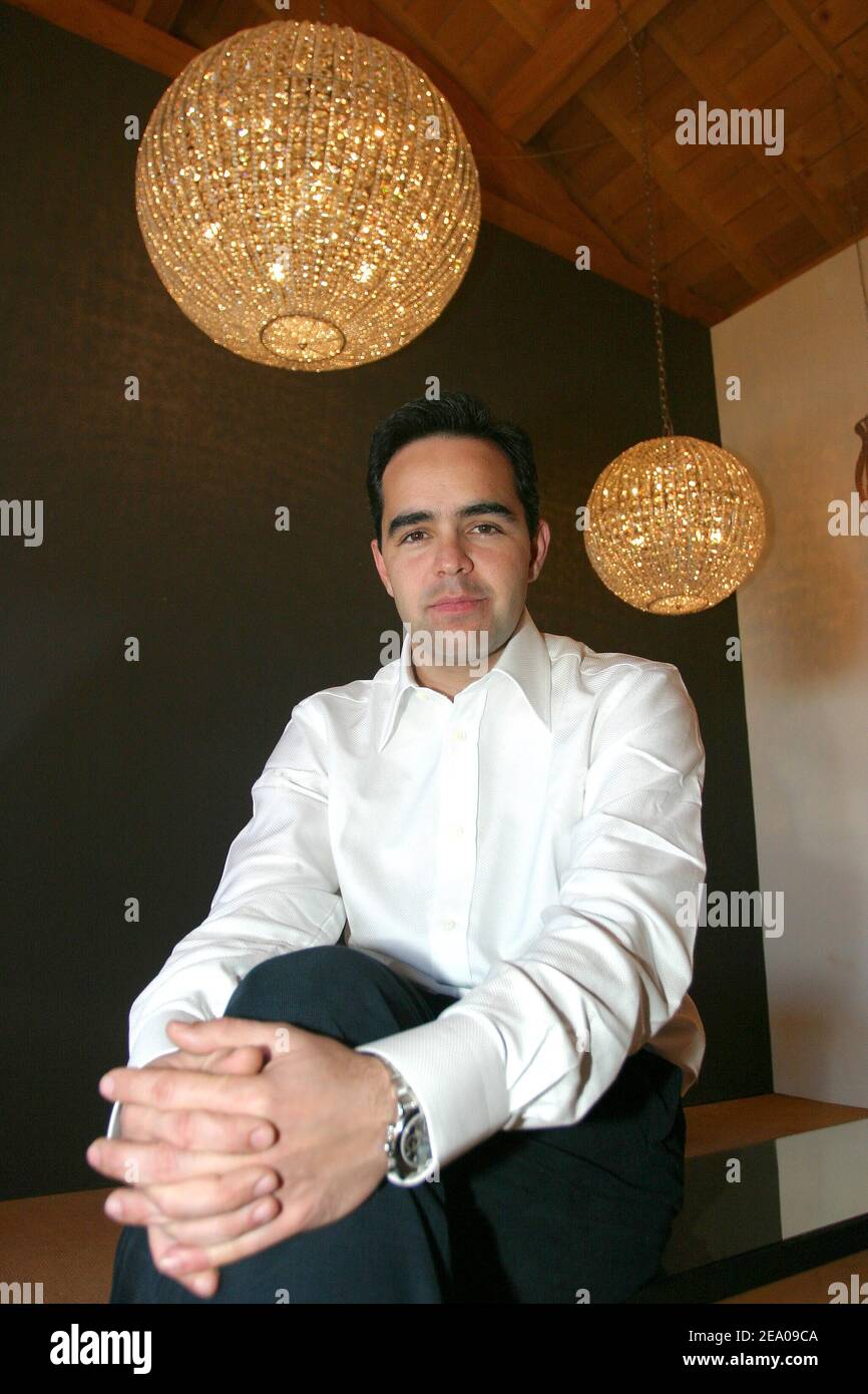 French chandelier designer, Regis Mathieu poses in his workshop, in Apt ...