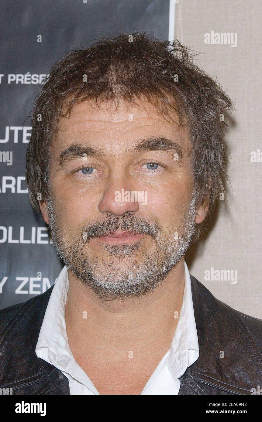 French actor/director Olivier Marchal poses for pictures as he arrives ...