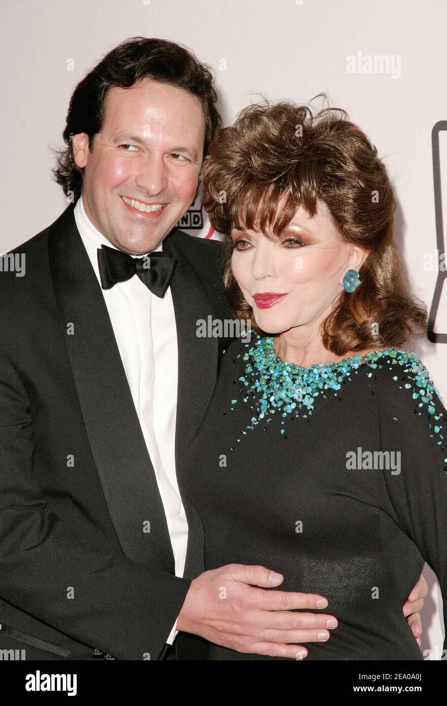 British actress Joan Collins and husband Percy Gibson attend the 2005 ...