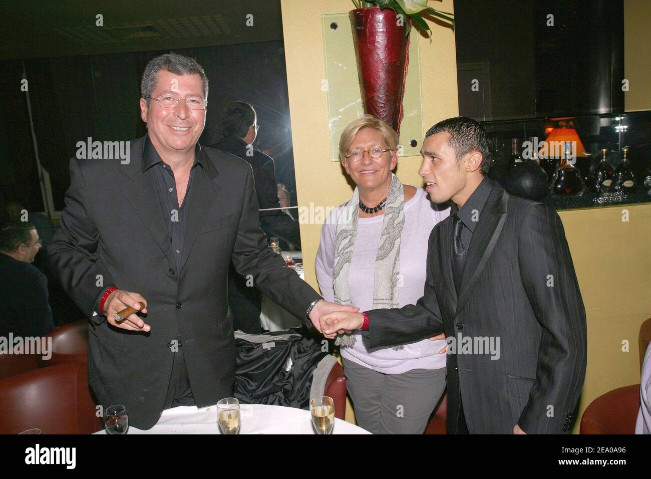 French boxer Brahim Asloum (R), with Levallois mayor Patrick Balkany ...