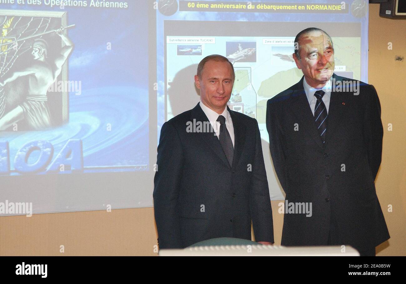Russian President Vladimir Putin his French counterpart Jacques Chirac ...
